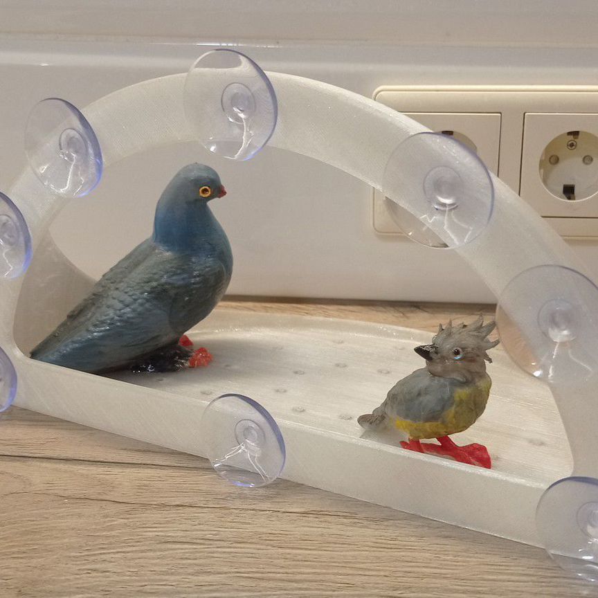 Кормушка для птиц на окно