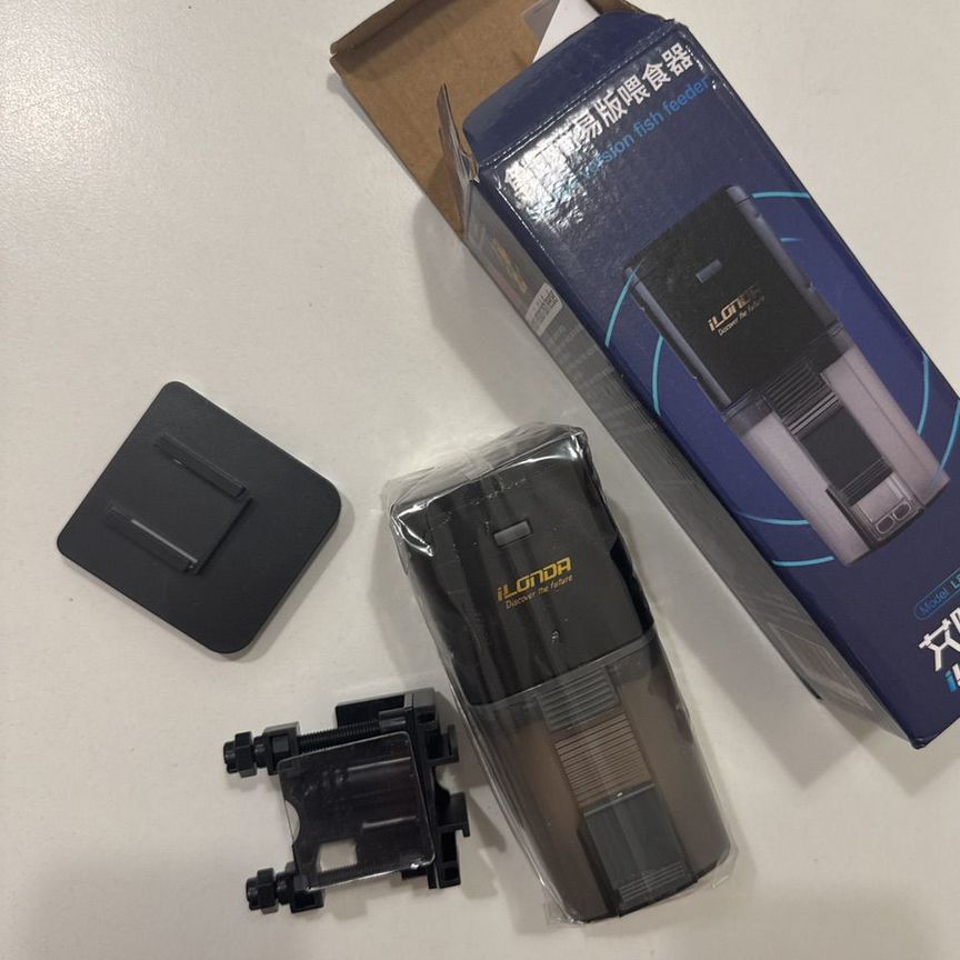 Автоматическая кормушка для рыб в аквариум