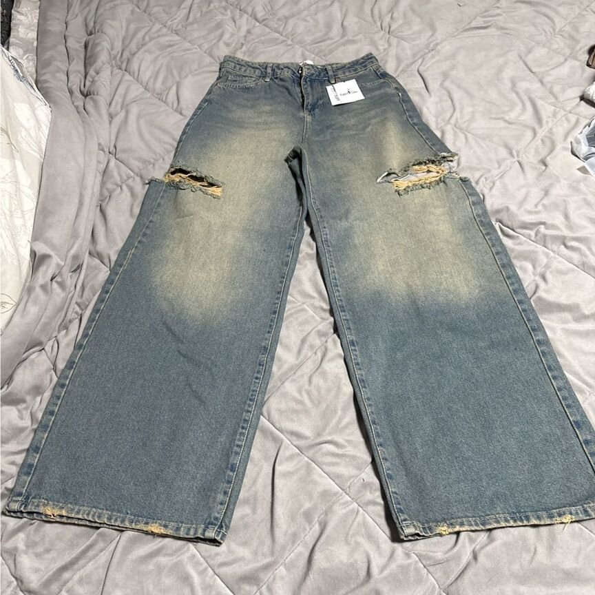 Джинсы широкие